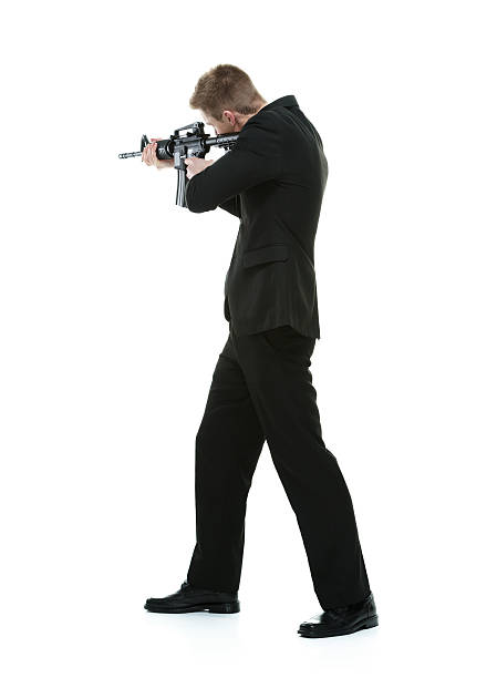 Man Pointing Gun Suit Full Body Pictures, Images and Stock Photos - iStock Man Pointing Gun Suit Full Body Pictures, Images and Stock Photos - iStock