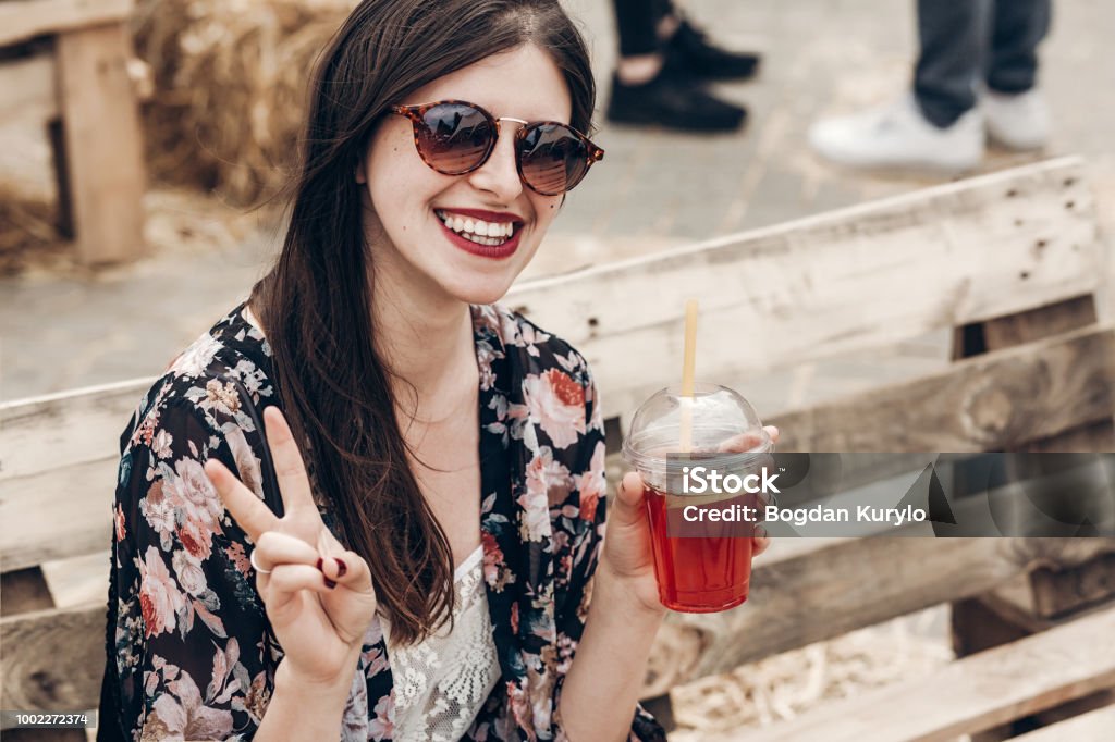 Stylish Hipster Woman In Sunglasses With Red Lips Drinking Lemonade