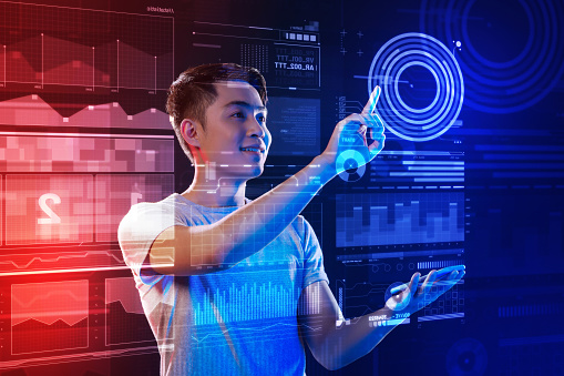 Positive Web Developer Smiling And Touching The Screen Stock Photo ... Positive Web Developer Smiling And Touching The Screen Stock Photo ...