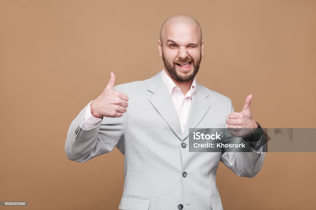 Portrait Of Funny Satisfied Handsome Middle Aged Bald Bearded