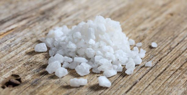 Free Stock Photo of A pile of white crystals on a wooden surface ...
