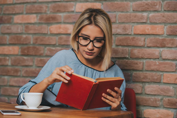Free Stock Photo of Open Book Resting on Wooden Table | Download Free ...