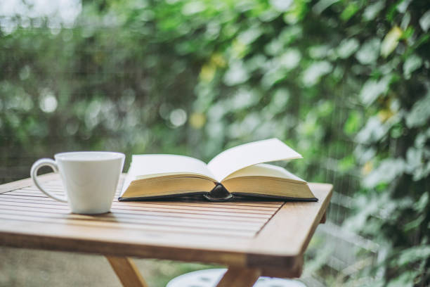 Free Stock Photo of A book and coffee cup on a table | Download Free ...