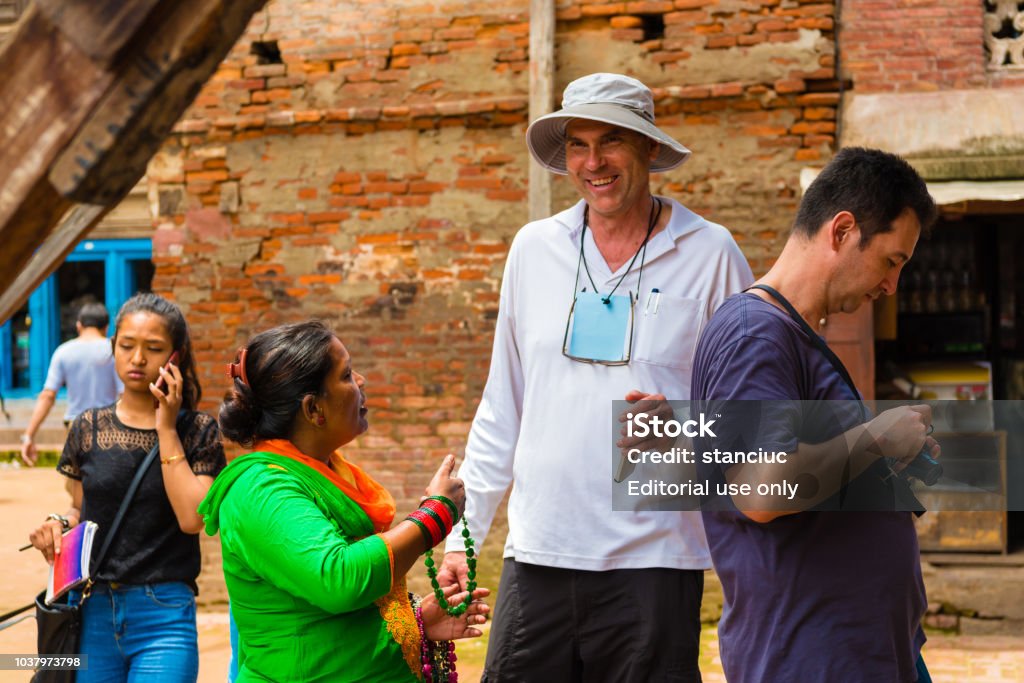 Tourists Buying Souvenirs At Patan Durbar Square Kathmandu Valley Nepal ... Tourists Buying Souvenirs At Patan Durbar Square Kathmandu Valley Nepal ...