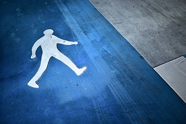 Free Stock Photo of Person Walking Across Parking Lot Next to Sign ...