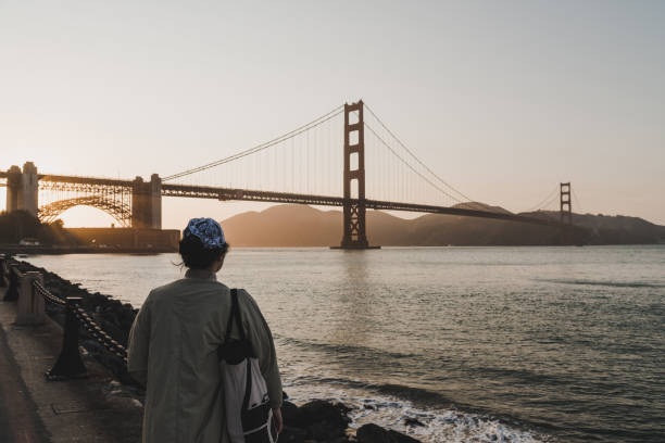 Free Stock Photo of Woman Standing in Front of the Golden Gate Bridge ...