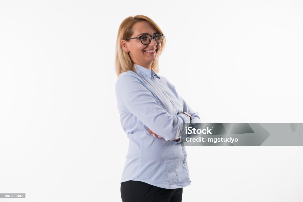 Portrait Of Smiling Business Woman With Folded Hands Isolated On White