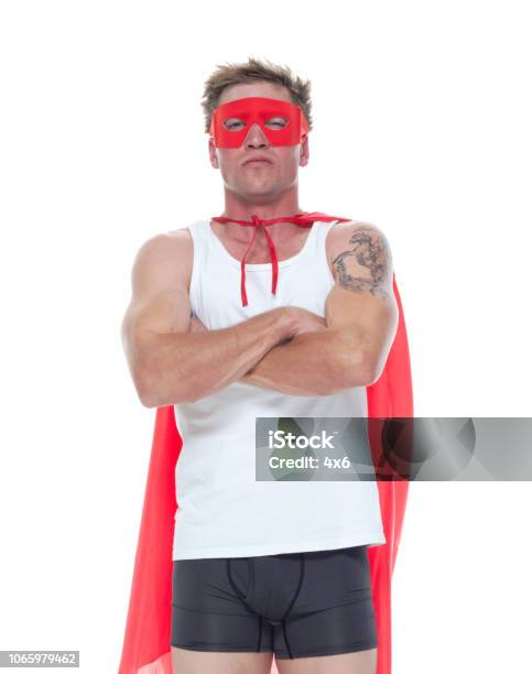 Man In Casual Clothes With Super Hero Cape Is Caught With His Pants