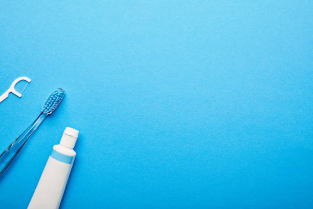 Free Stock Photo of Red Background With White Toothbrush and Toothpaste ...