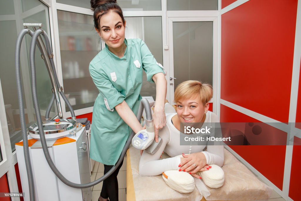 Woman Having Procedure Of Anti Cellulite Lpg Massage Cosmetology Clinic