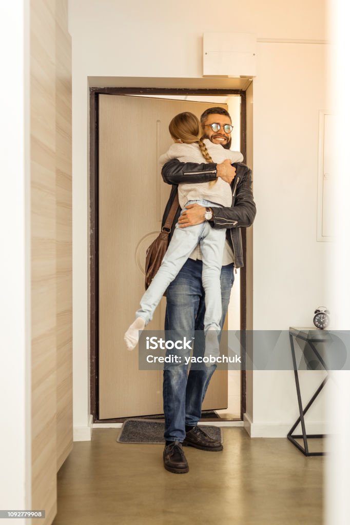 Attractive Tall Shorthaired Bearded Man From Generation Y Holding His