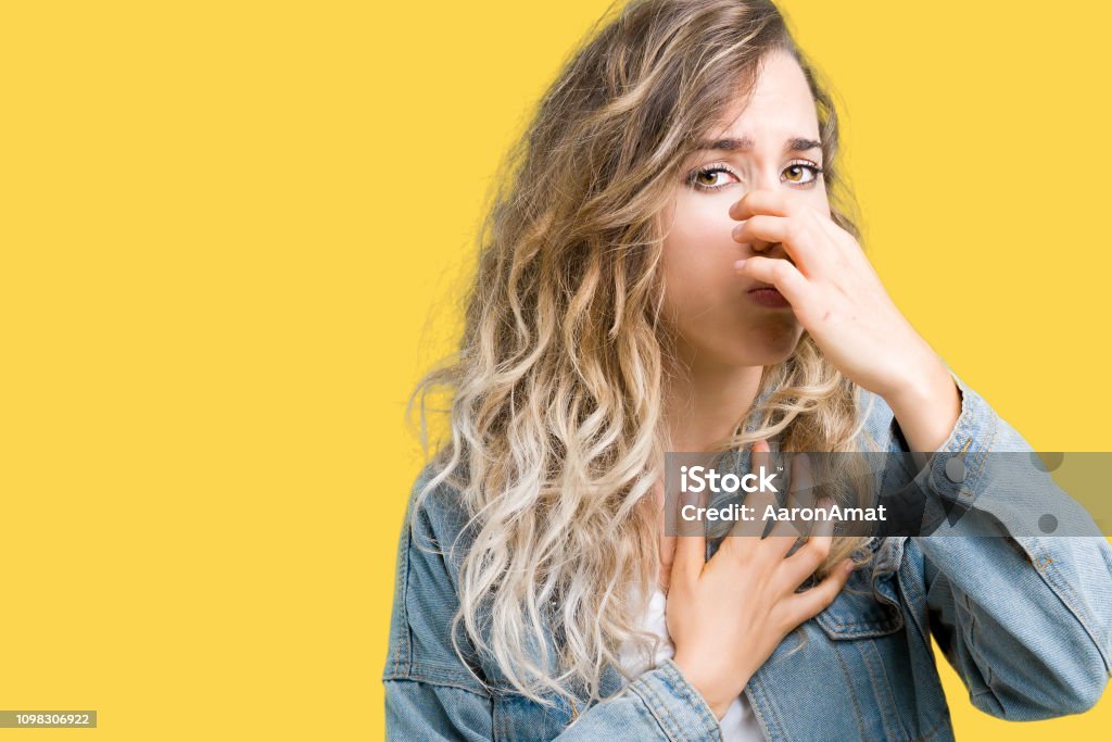 Beautiful Young Blonde Woman Wearing Denim Jacket Over Isolated
