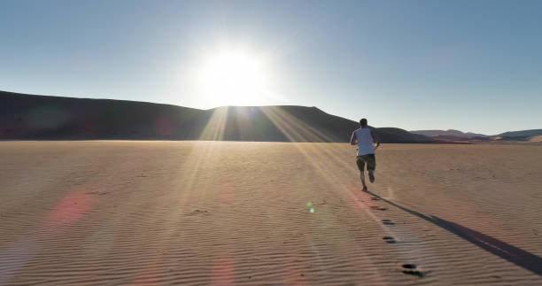 Free Stock Photo of Backside view of man running on the desert ...