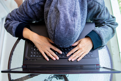 Woman Hacker Programmer Is Working On Computer In Cyber Security Center