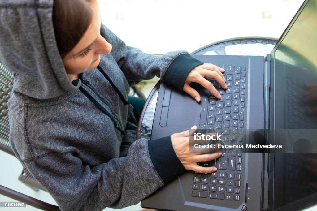Woman Hacker Programmer Is Working On Computer In Cyber Security Center