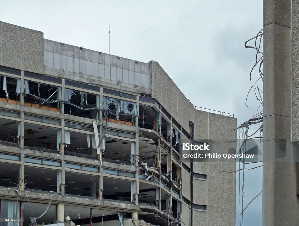 A Large Destroyed Collapsing Building With Exposed Walls And Smashed ... A Large Destroyed Collapsing Building With Exposed Walls And Smashed ...