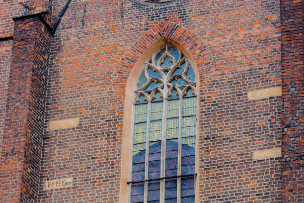 Free picture: Tall vertical gothic windows on brick wall