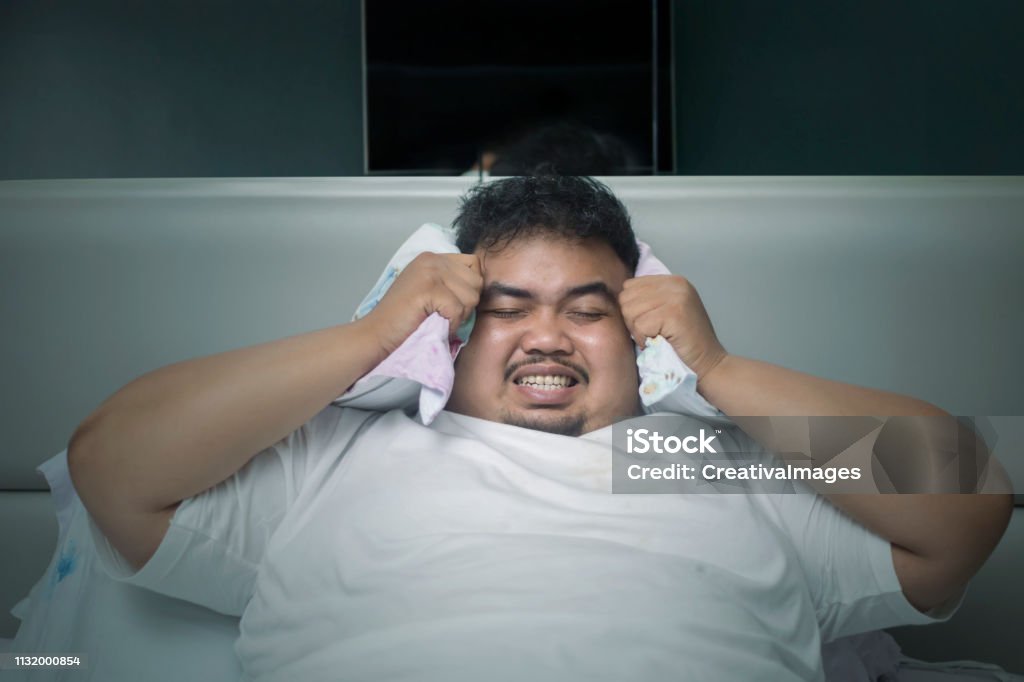 Angry Obese Man Unable To Sleep Stock Photo - Download Image Now ... Angry Obese Man Unable To Sleep Stock Photo - Download Image Now ...