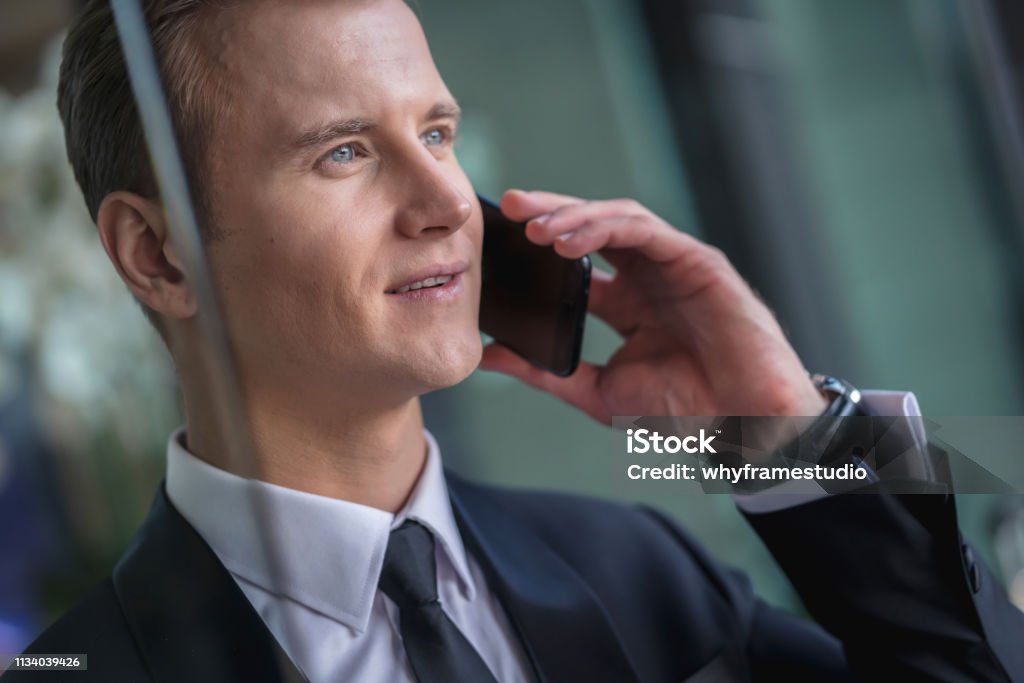 Smart Caucasian Businessman Black Suit Hand Hold Speaking Smartphone Walk Pass Glass Entrance