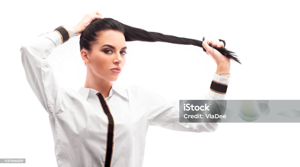 Young Attractive Woman Holding Her Strong Hair Shampoo Concept Isolated
