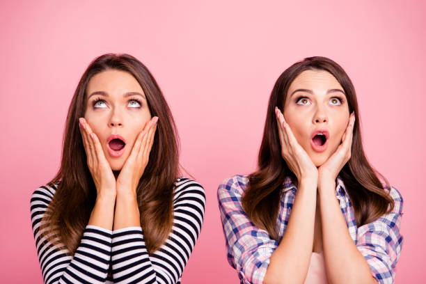 90 Two Beautiful Girls Look Shocked And Horrified Mouths Open Stock