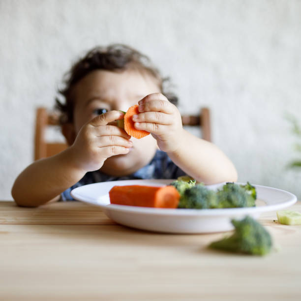 One Baby Carrot Stock Photos, Pictures & Royalty-Free Images - iStock One Baby Carrot Stock Photos, Pictures & Royalty-Free Images - iStock