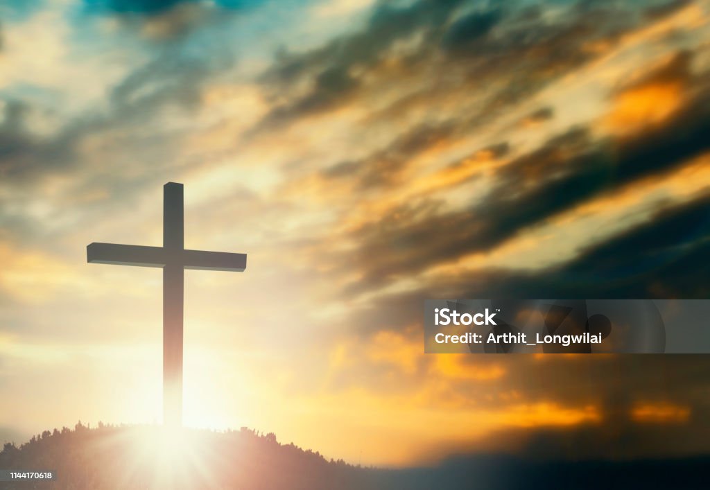 Siluet Yesus Dengan Konsep Cross Over Sunset Untuk Agama Ibadah Natal