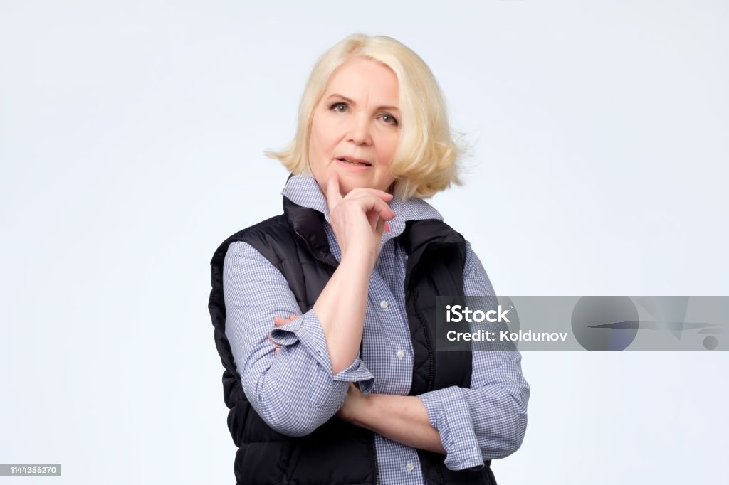 Senior Woman Smirking Thinking Trying Create Plan In Mind Stock Photo ... Senior Woman Smirking Thinking Trying Create Plan In Mind Stock Photo ...