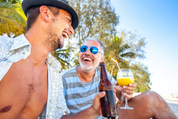 40 Mature Older Senior Gay Male Couple Smiling And Affectionate Stock