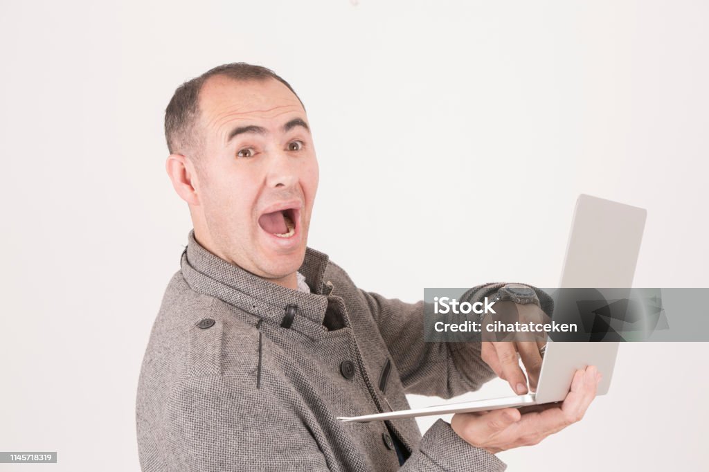 Confused Businessman Using Computer Stock Photo - Download Image Now ... Confused Businessman Using Computer Stock Photo - Download Image Now ...