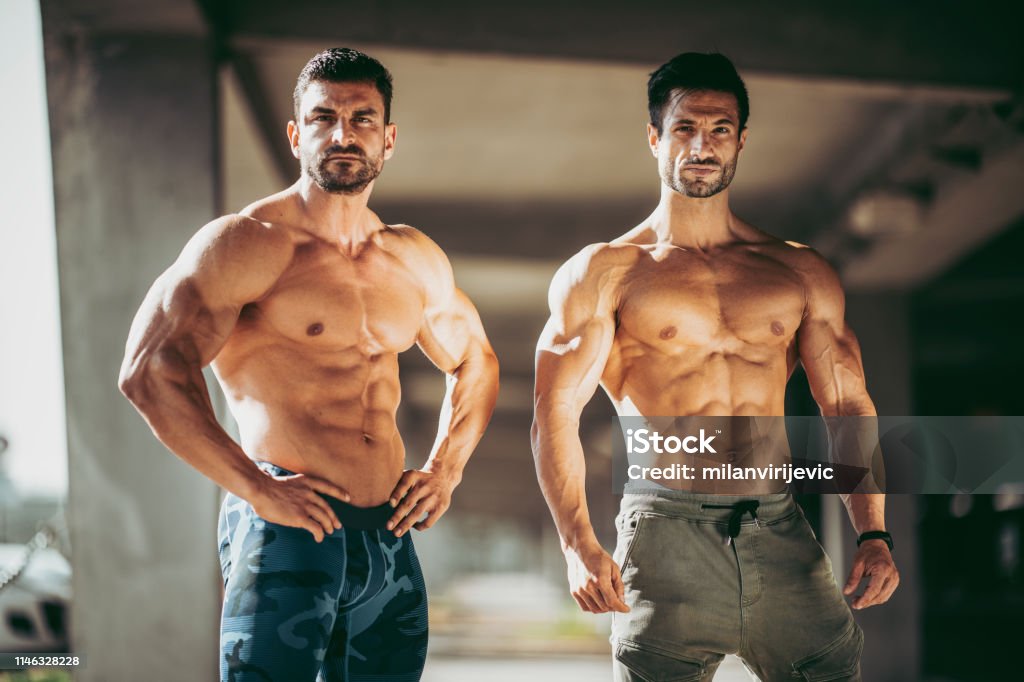 Handsome Muscular Men Two Bodybuilders Fashion Model Bodybuilders Posing After Workout Stock