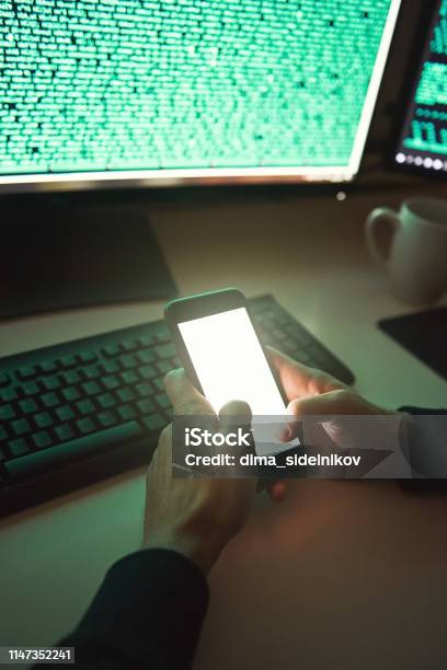 Professional Hacker Closeup Photo Of Young Hacker In Black Hoodie Using ... Professional Hacker Closeup Photo Of Young Hacker In Black Hoodie Using ...