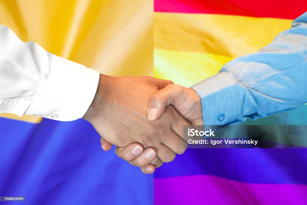Jabat Tangan Pada Latar Belakang Bendera Lgbt Gay Dan Ukraina Foto Stok Unduh Gambar Sekarang