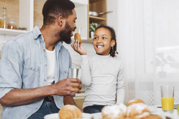 130+ Daughter Feeding Her Father Cereal Stock Photos, Pictures ... 130+ Daughter Feeding Her Father Cereal Stock Photos, Pictures ...