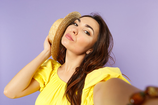 Close Up Selfie Shot Of Attractive Young Woman In Yellow Dress Hold