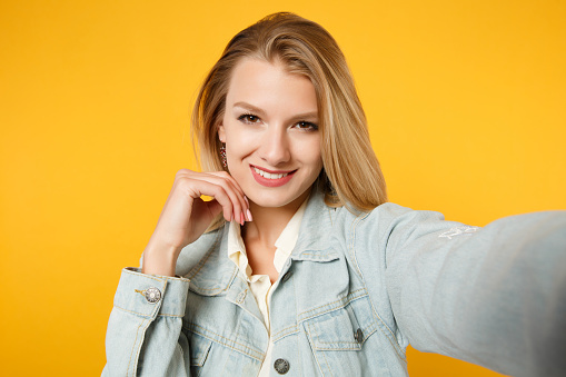 Close Up Selfie Shot Of Attractive Beautiful Young Woman In Denim