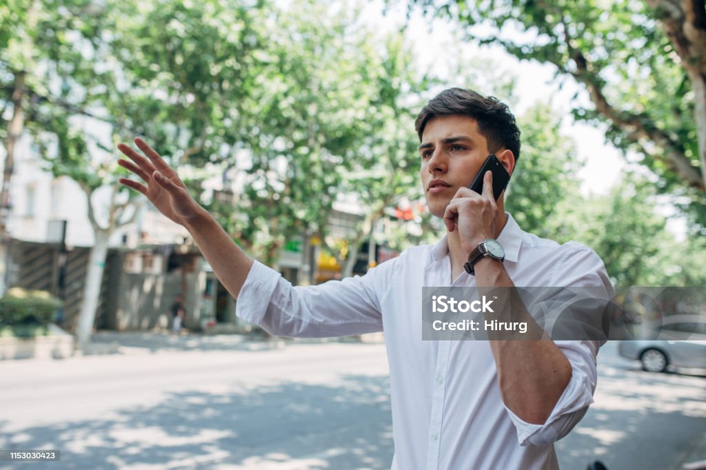 Handsome Man Catching Taxi Stock Photo - Download Image Now - Adult ... Handsome Man Catching Taxi Stock Photo - Download Image Now - Adult ...