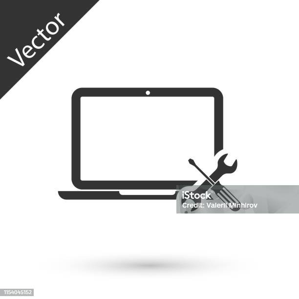 Beyaz Arka Planda Izole Tornavida Ve Anahtar Simgesi Ile Gri Laptop ... Beyaz Arka Planda Izole Tornavida Ve Anahtar Simgesi Ile Gri Laptop ...