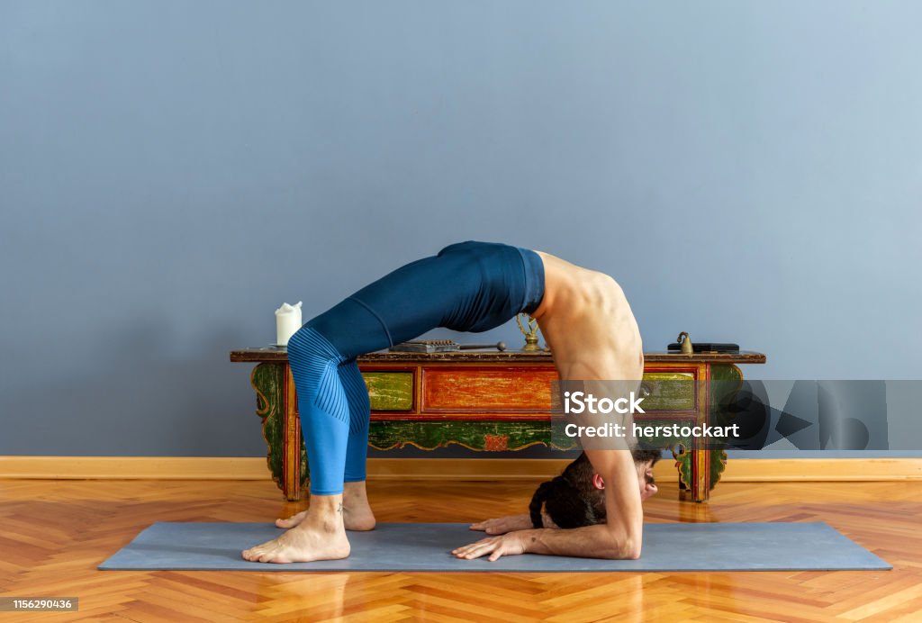 Man Twolegged Inverted Staff Or Dwi Pada Viparita Dandasana Pose In