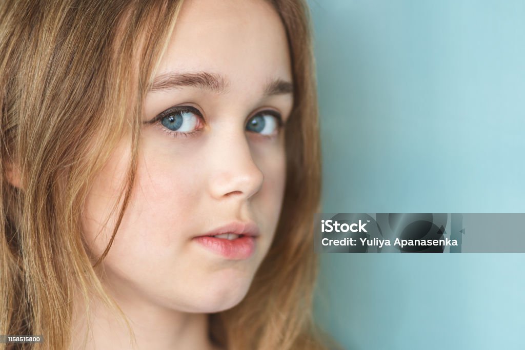 Portrait Of Beautiful Young Woman With Brown Hair Closeup Face Of A