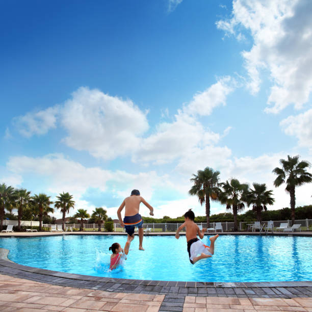 100+ Teenage Boy And Girl Jumping Into Pool Stock Photos, Pictures ... 100+ Teenage Boy And Girl Jumping Into Pool Stock Photos, Pictures ...