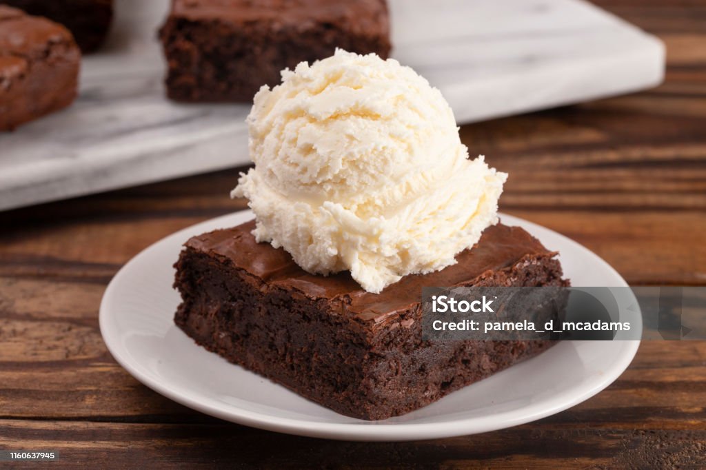 Homemade Double Chocolate Brownies Sundae With Vanilla Ice Cream On Top