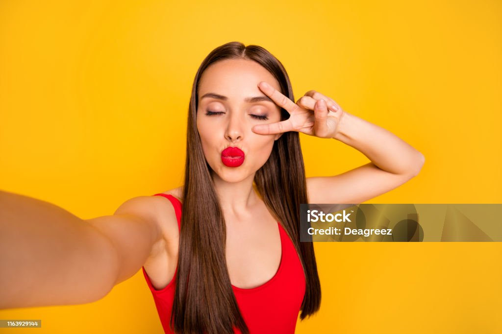 Photo Of Beautiful Amazing Lovely Lady Making Selfies Vsign Symbol Send