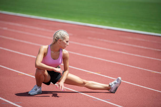 Free Stock Photo of Female Athlete trying to stretch | Download Free ...
