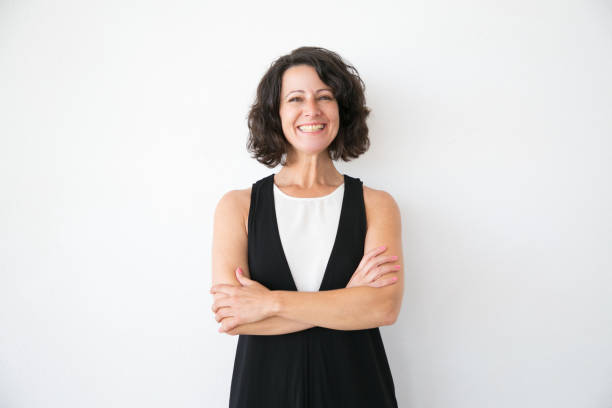 560 Portrait Of Smiling Business Woman With Folded Hands Isolated On