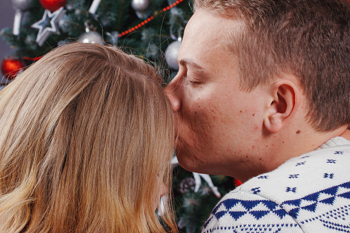 Young Romantic Cute Couple Staying At Home And Enjoying Time Together Lovers Hugging In Cristmas