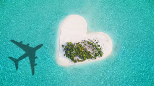 Free picture: Heart shaped island with buildings and boats in the water ...