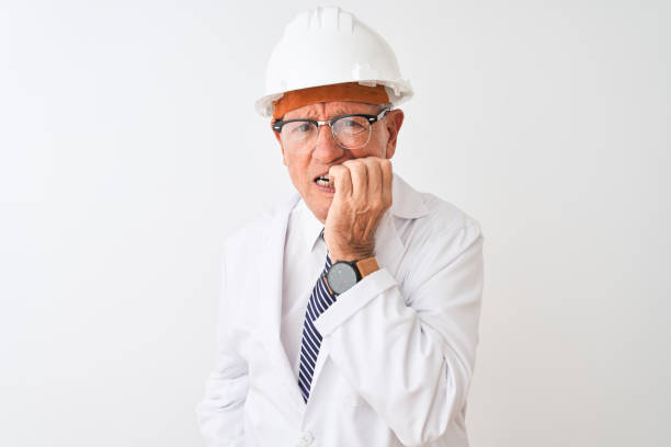 Free Stock Photo of Panicking male engineer standing on white ...