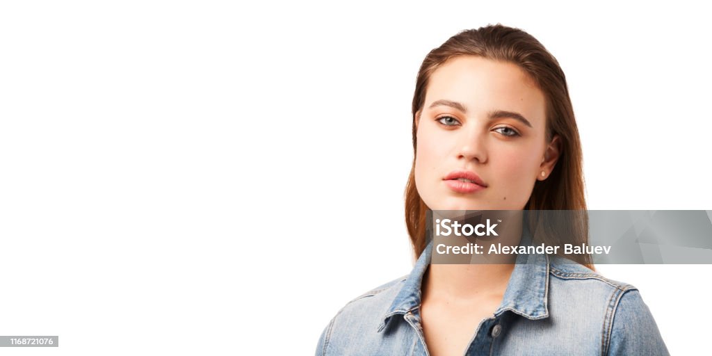 Teenage Beautiful Caucasian Girl Isolated On White Background In Jean