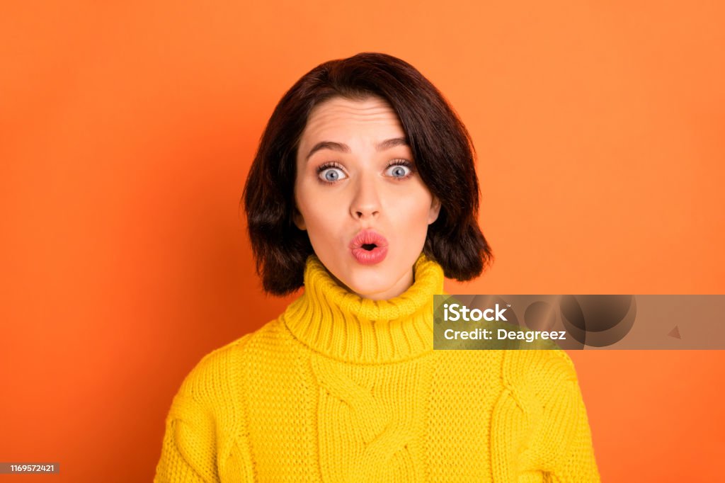 Photo Of Nice Cheerful Cute Girlfriend Kissing You Through Camera While Isolated With Orange